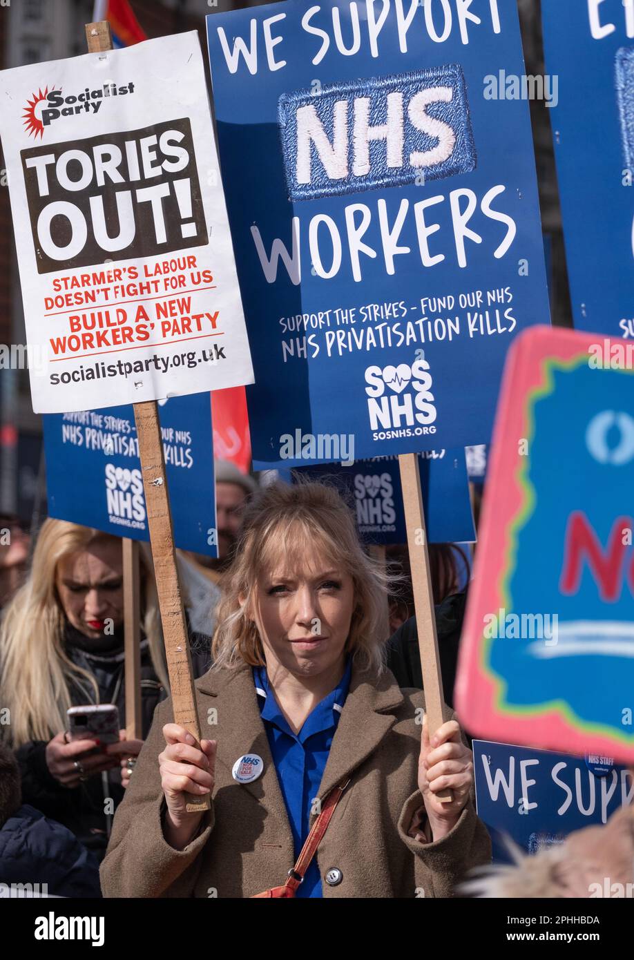 Protester at the SOS NHS National Demo in London, supporting striking ...