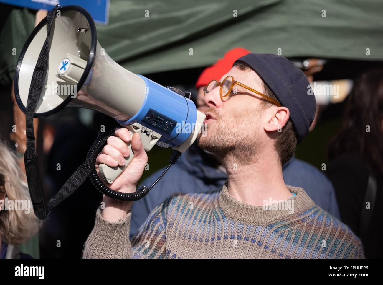 Protester using a megaphone at the SOS NHS National Demo in London ...