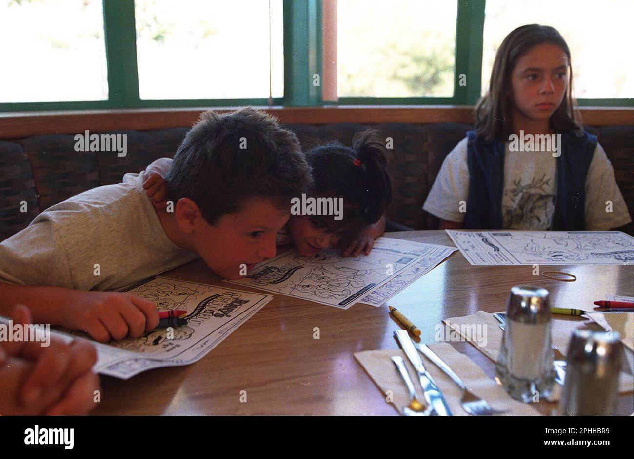 JASON TABLE/C/30AUG96/CD/LS Jason and Vicky clown around at the Lyon's ...