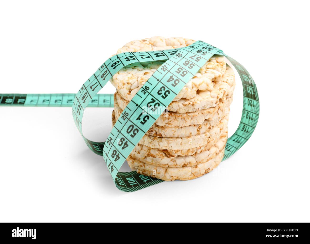 Rice cakes and blue measuring tape on white background. Diet concept ...