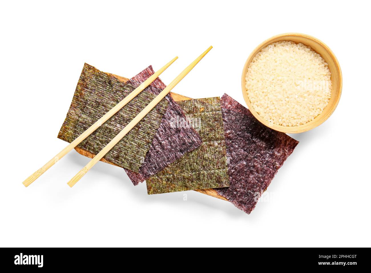 Natural nori sheets, chopsticks and bowl of rice isolated on white ...