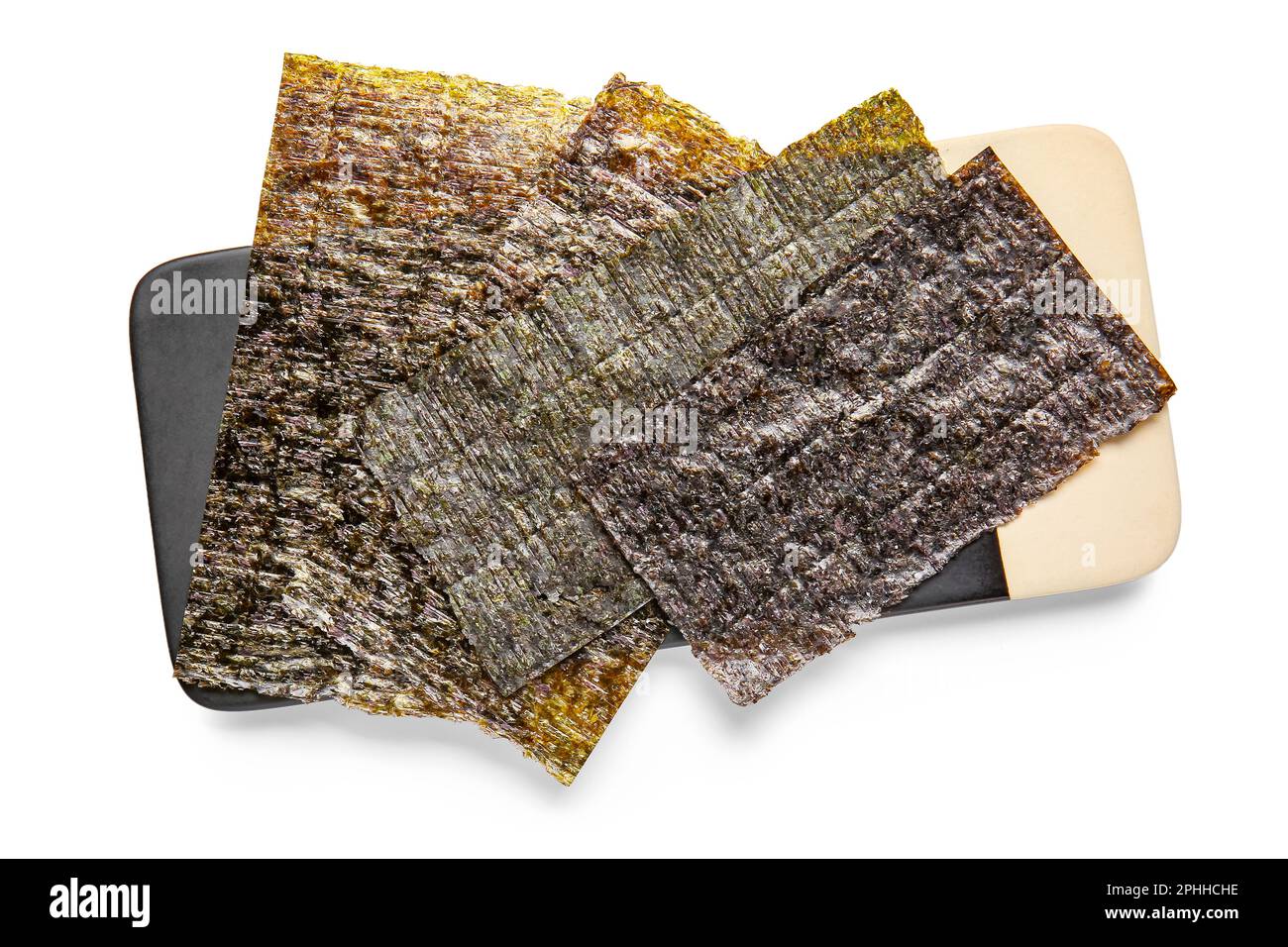 Board with natural nori sheets isolated on white background Stock Photo ...