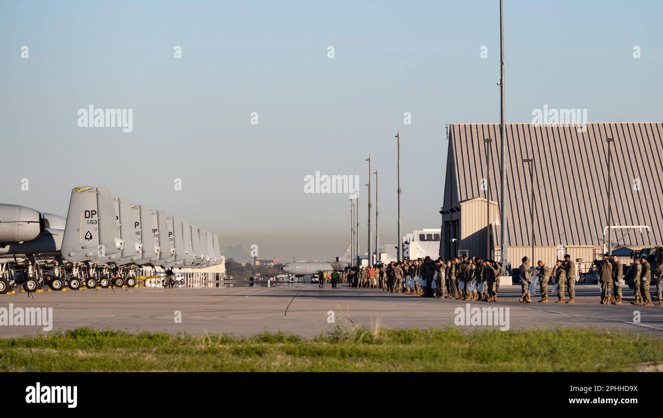 Desert Lightning Team members walk along the flight line in search of ...