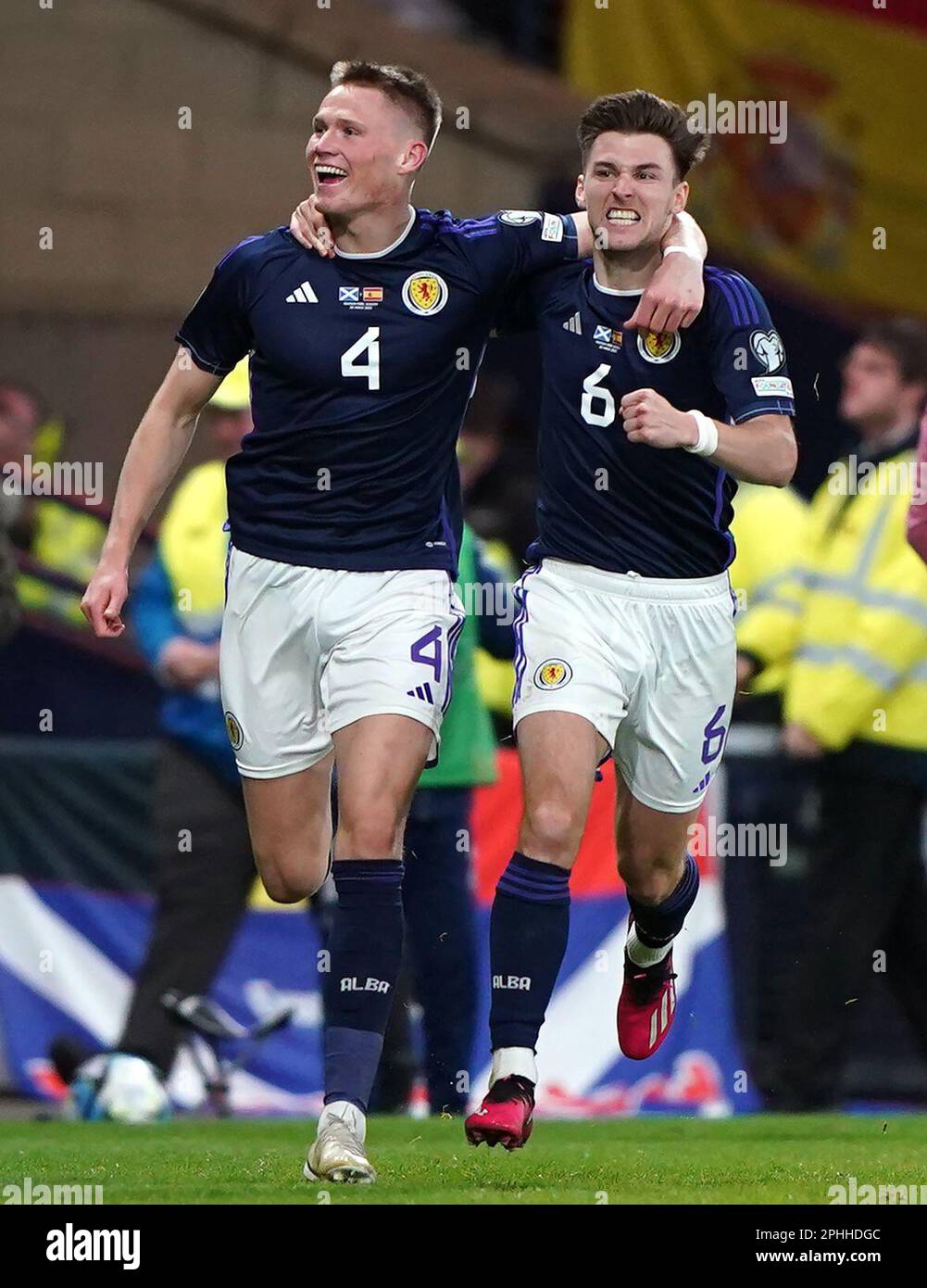 Scotland's Scott McTominay (left) celebrates scoring their side's ...