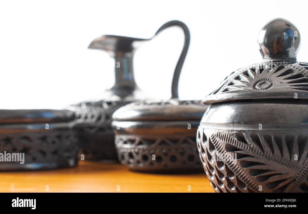 Typical Mexican handicraft. Set of black clay pots handmade in Oaxaca ...