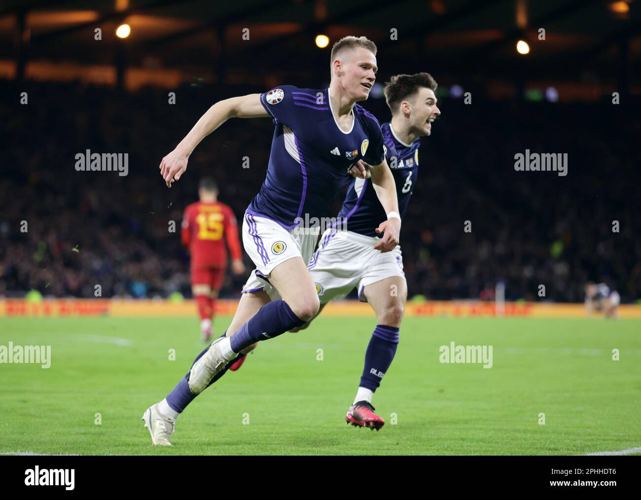 Scotland's Scott McTominay (left) celebrates scoring their side's ...