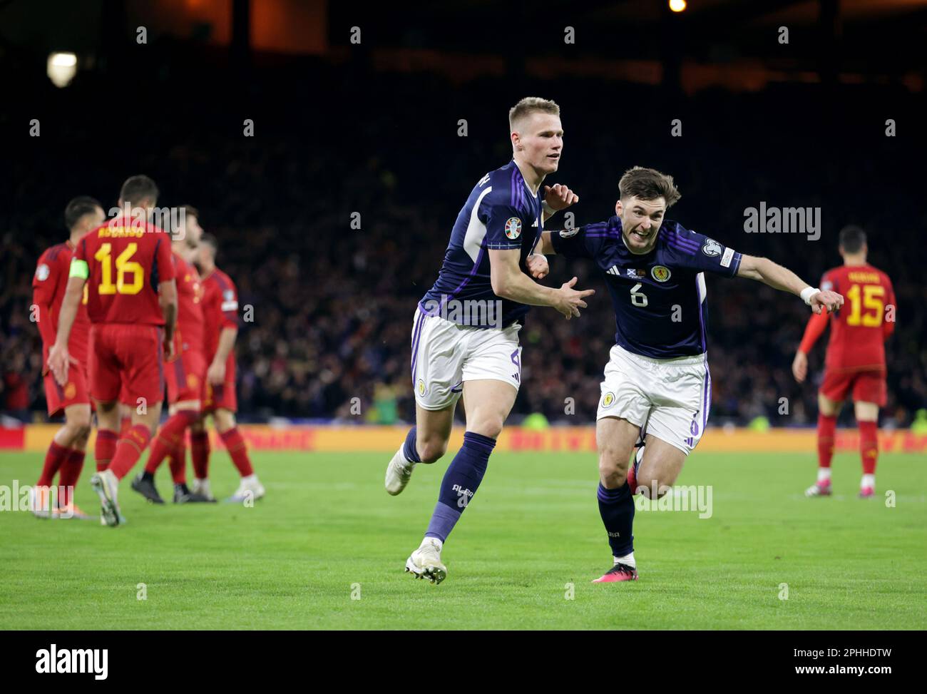 Scotland's Scott McTominay (left) celebrates scoring their side's ...