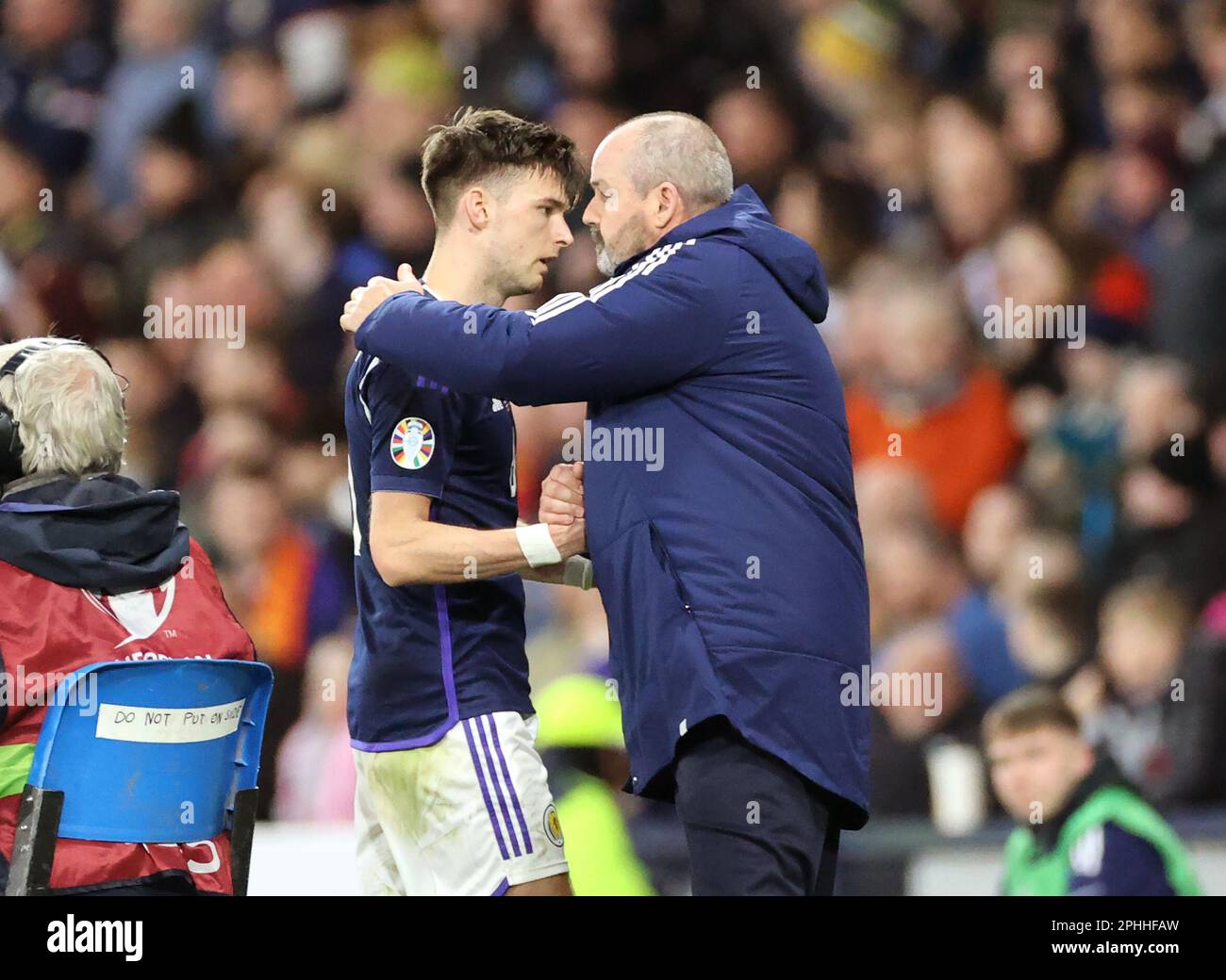 Scotland's Kieran Tierney greets manager Steve Clarke as he is ...