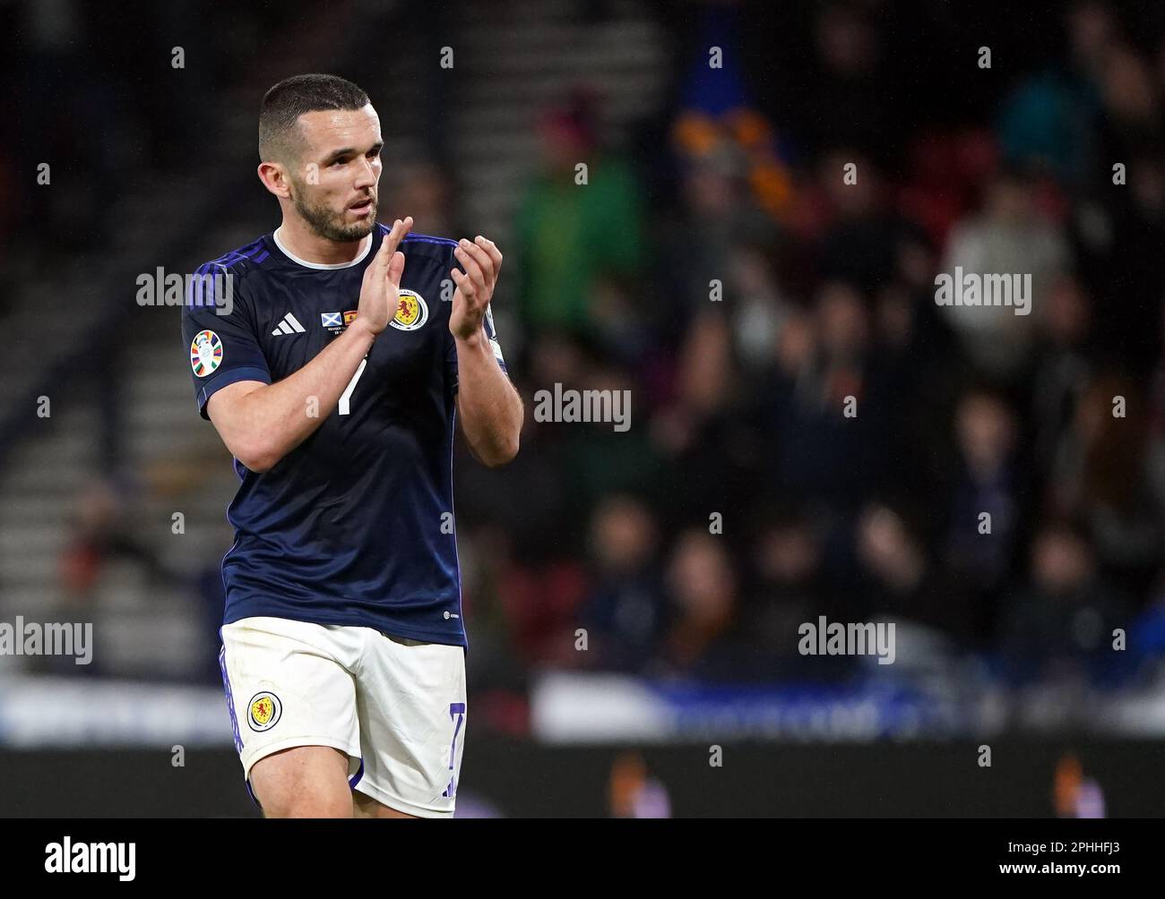 Scotland's John McGinn applauds the fans as he is substituted off ...