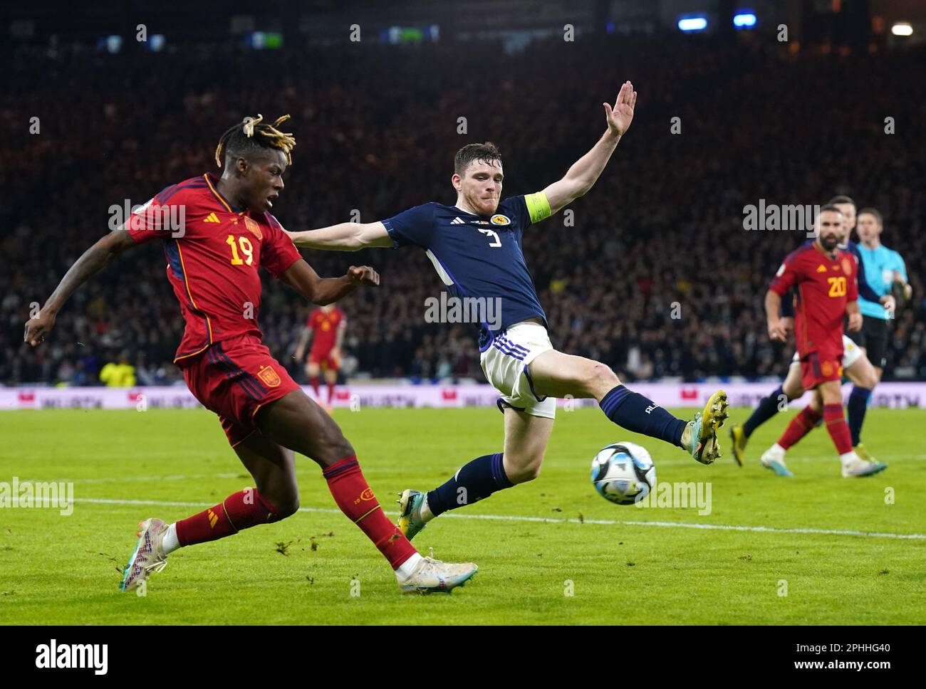 Spain's Nico Williams (left) and Scotland's Andrew Robertson battle for ...