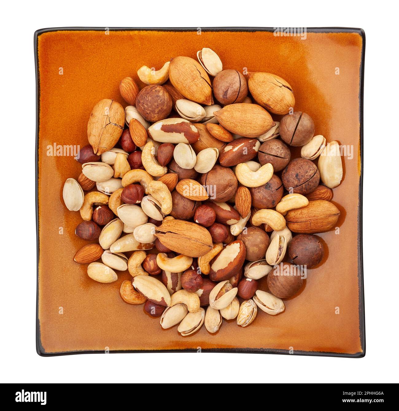 nut mix plate path isolated on white Stock Photo - Alamy