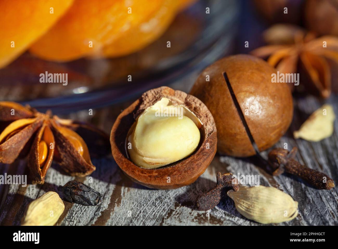 peeled macadamia nut on wood background Stock Photo - Alamy