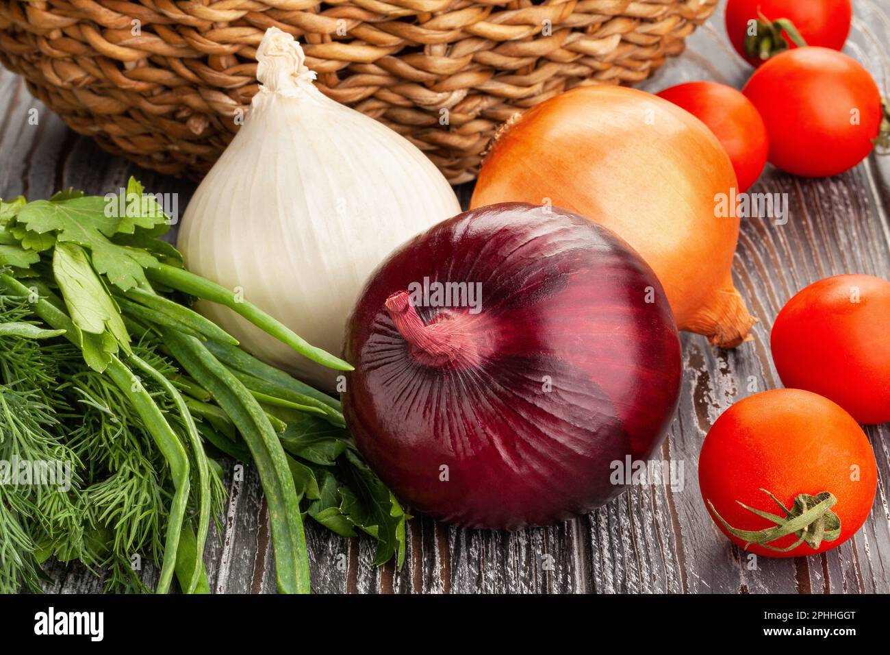 colorful onions on wood background Stock Photo - Alamy
