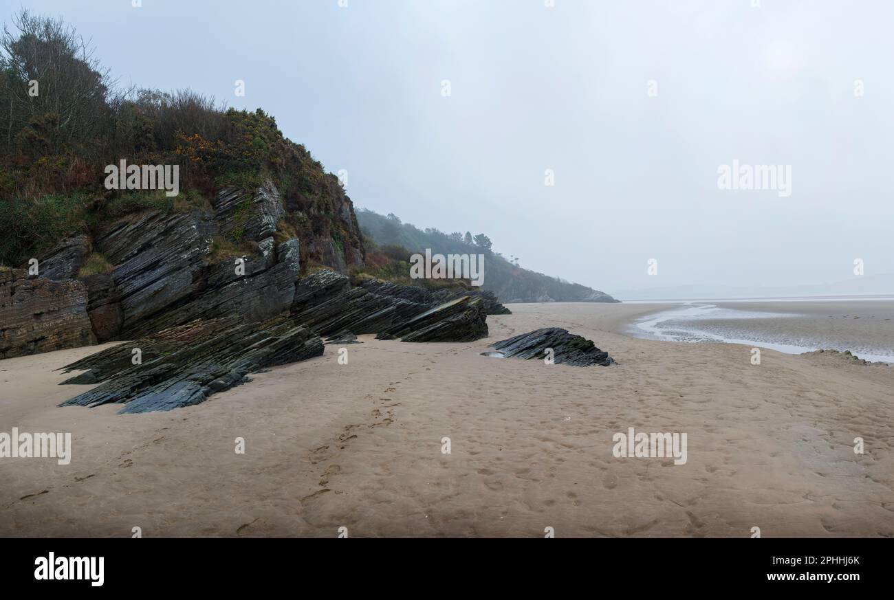 The light sand beach at Portmeirion in North Wales on a cloudy day ...