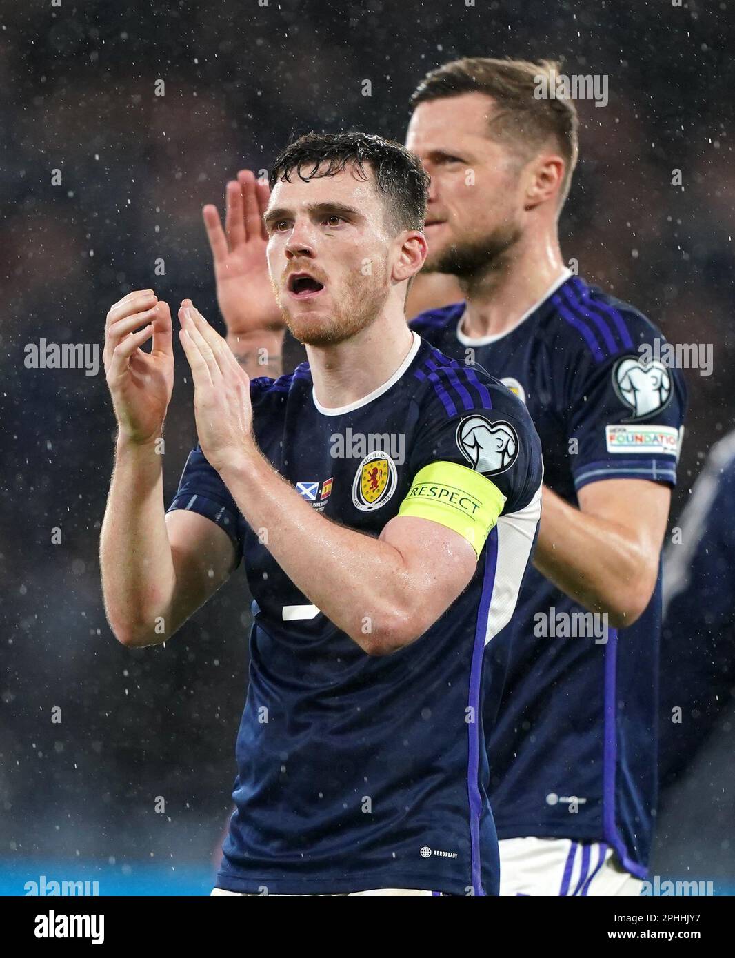 Scotland's Andrew Robertson (left) and Liam Cooper applaud the fans ...