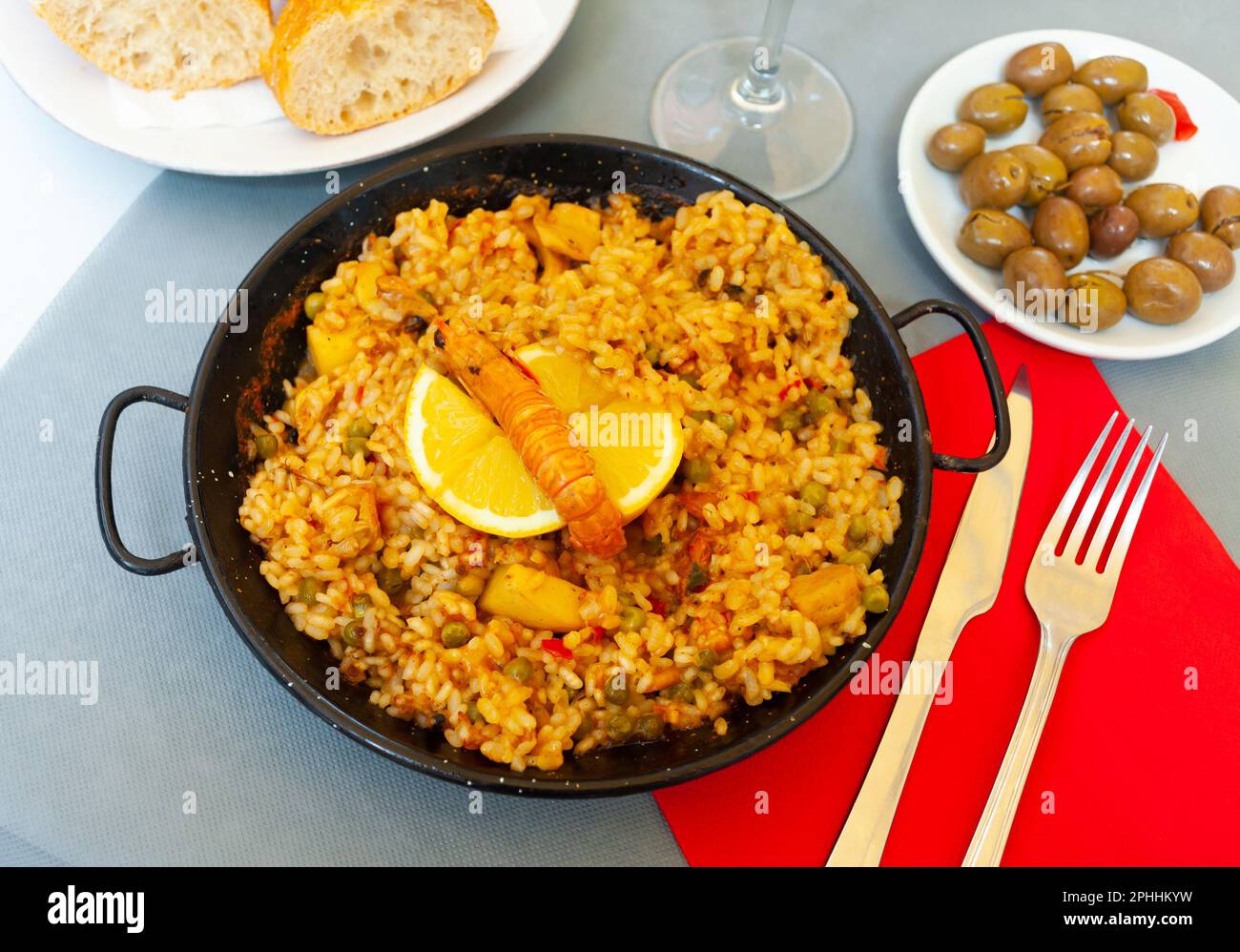 Spainsh dish seafood paella with rice, shrimps and mussels Stock Photo ...