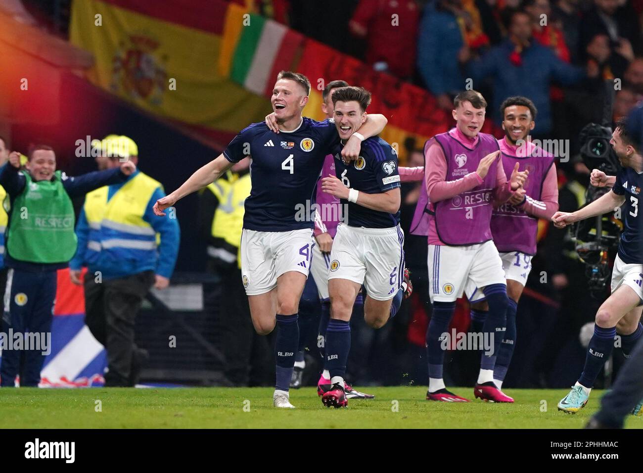 Scotland's Scott McTominay (left) celebrates scoring their side's ...