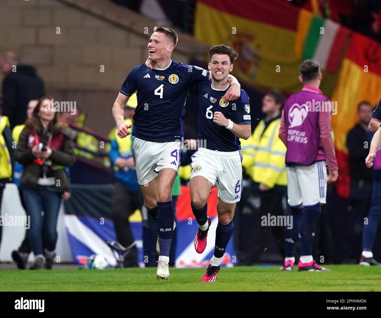 Scotland's Scott McTominay (left) celebrates scoring their side's ...