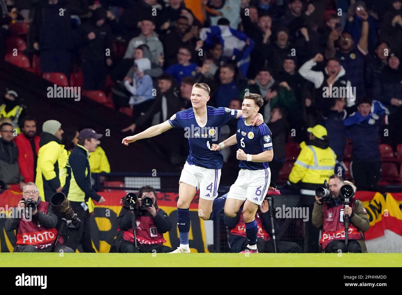 Scotland's Scott McTominay (left) celebrates scoring their side's ...