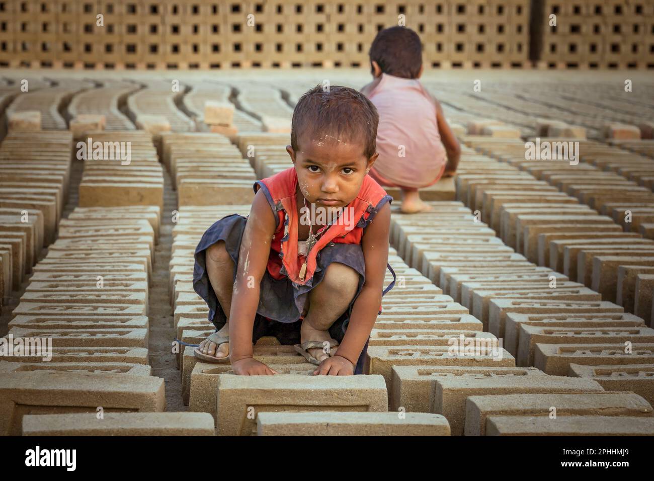 Children working in a Nepali brick kiln. In recent years, the number of ...