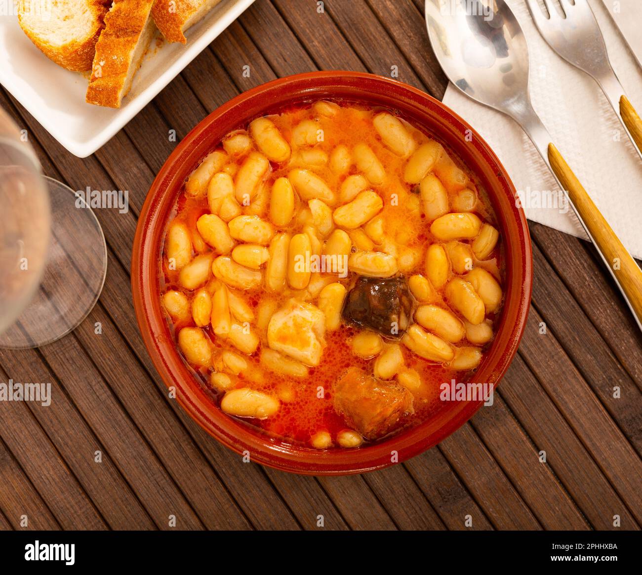 Fabada asturiana with stewed beans, pork, morcilla, chorizo in clay ...