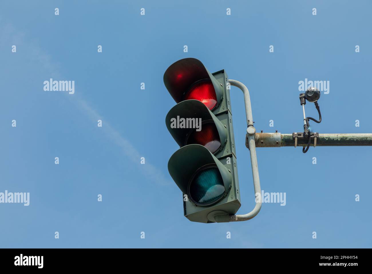 detail of red traffic light in Germany with camera Stock Photo - Alamy