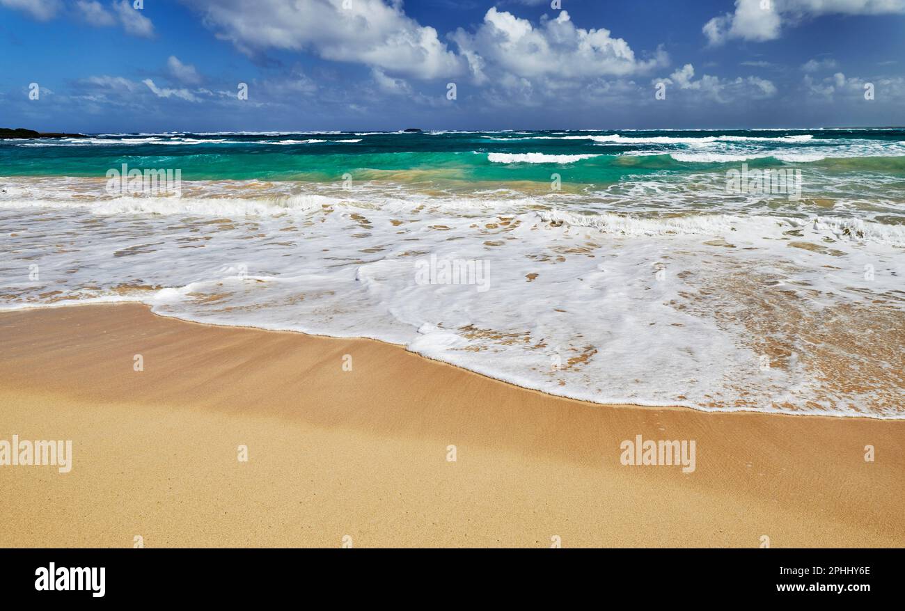 Shore Break waves on a Tropical Beach Stock Photo - Alamy