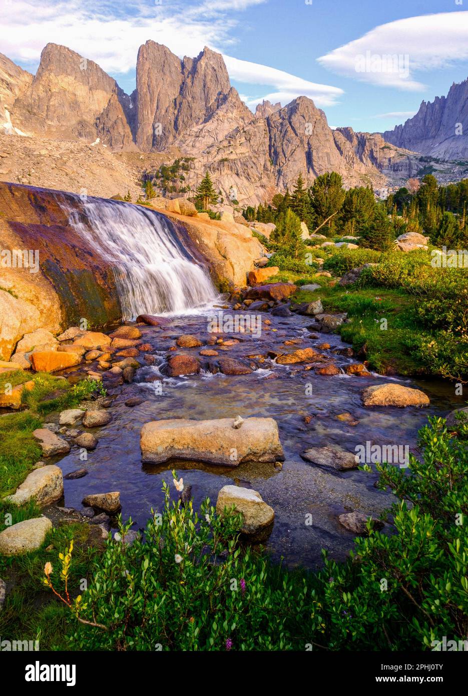 A Waterfall Among Steep Granite Mountains. Cirque of Towers, Wind River Range, Wyoming Stock ...