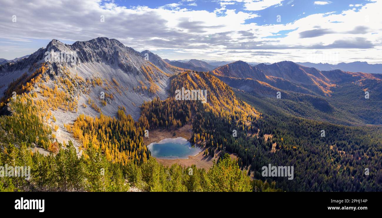 Sunset Illuminates Golden Larches, Mountain Summits, and an Alpine Lake ...
