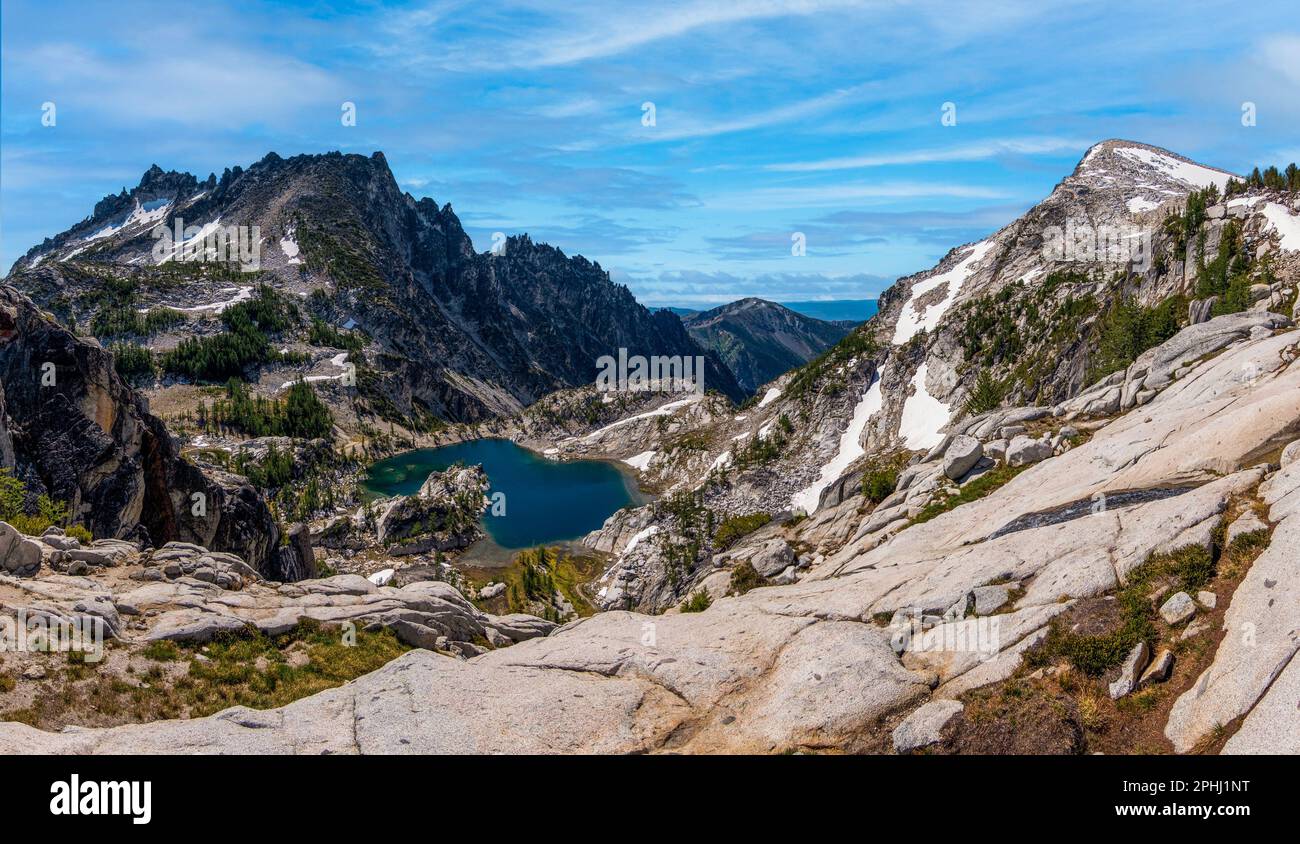 A Waterfall Plunges Towards Crystal Lake Below Mclellan Peak, The ...