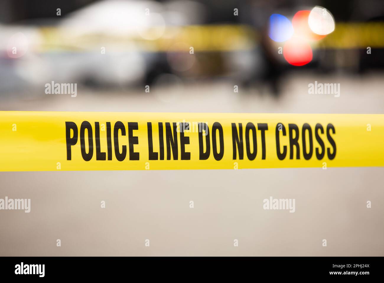 Cordon tape seals off a crime scene and establishes a police line for ...