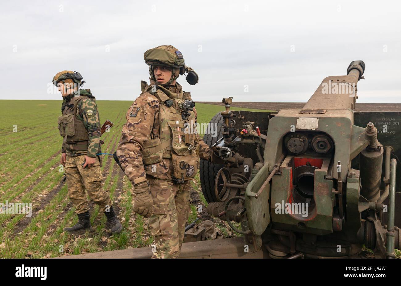 March 21, 2023, Donetsk region, Ukraine: An artillery crew waits for ...
