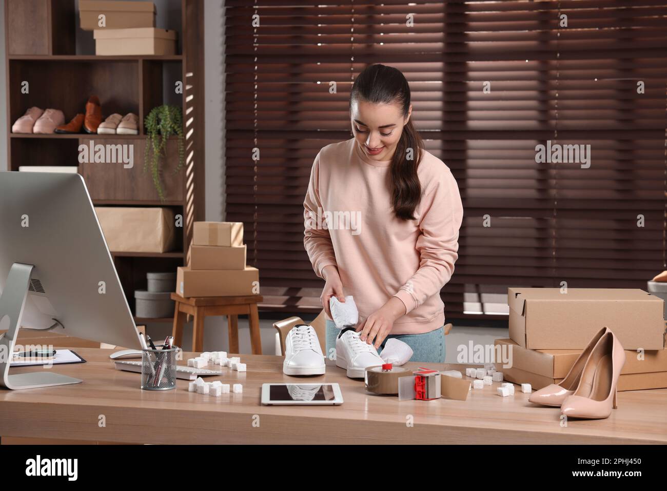 Sneakers shoes packing hi-res stock photography and images - Alamy