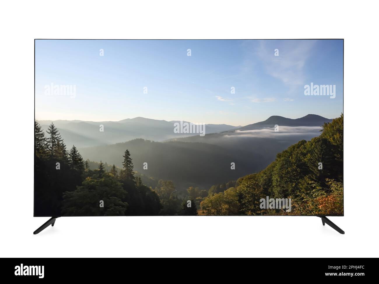 Modern wide screen TV monitor showing beautiful mountain landscape ...