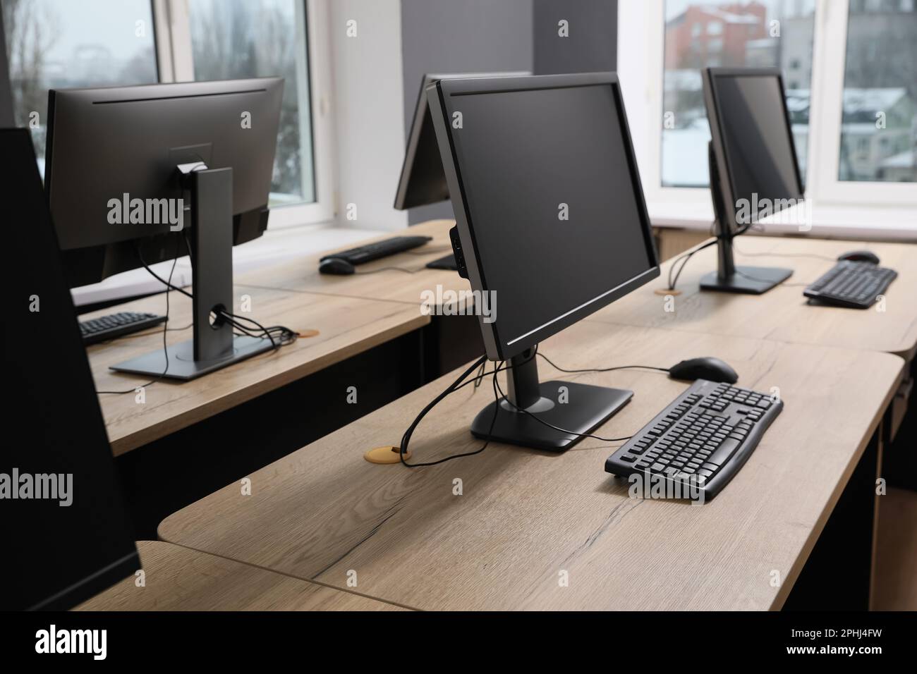 Rows of computers in empty office hi-res stock photography and images ...