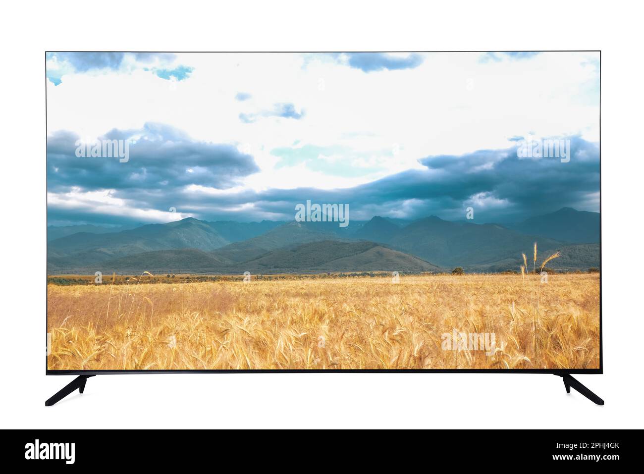 Modern wide screen TV monitor showing picturesque view of wheat field ...