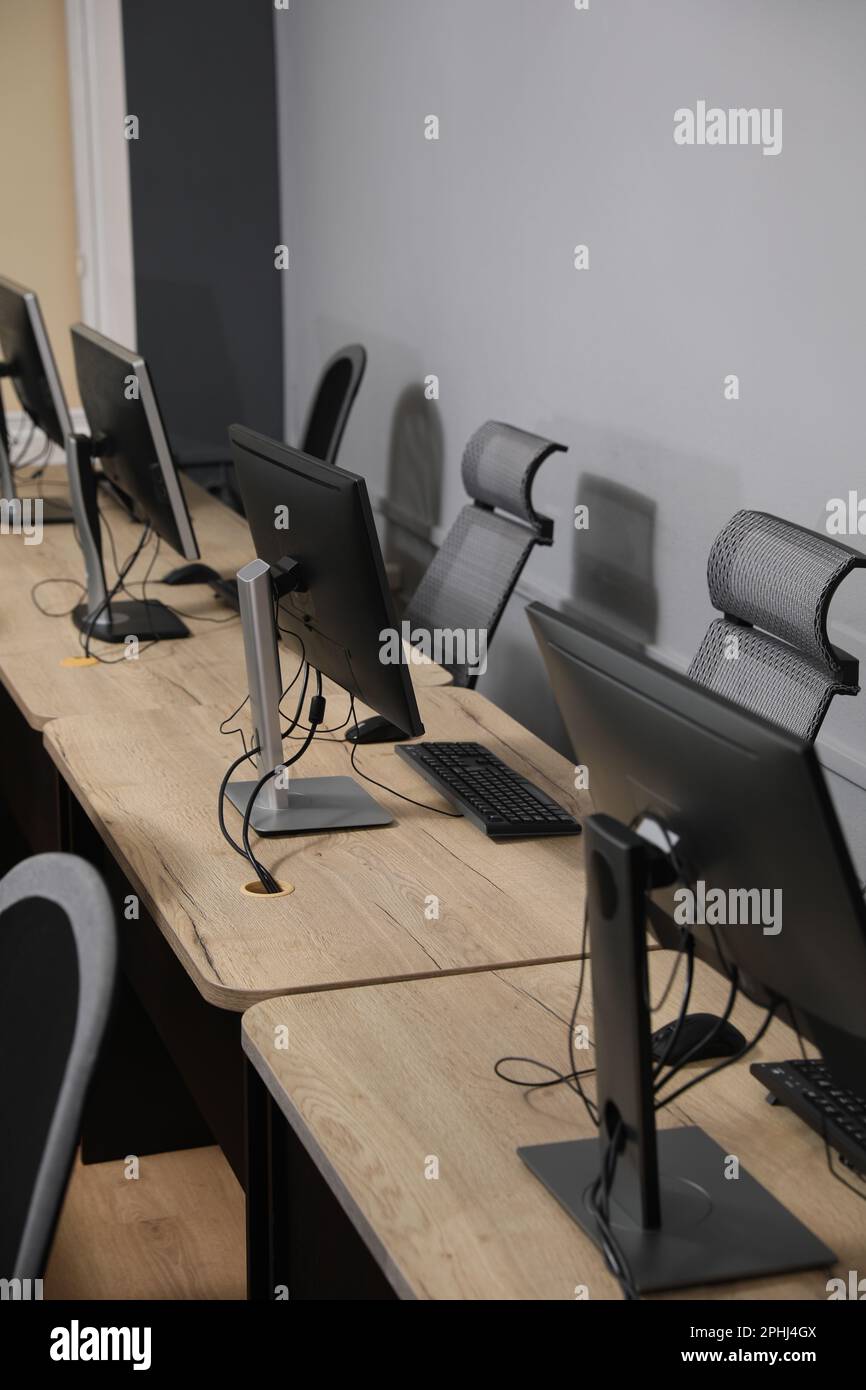 Many modern computers in open space office Stock Photo - Alamy