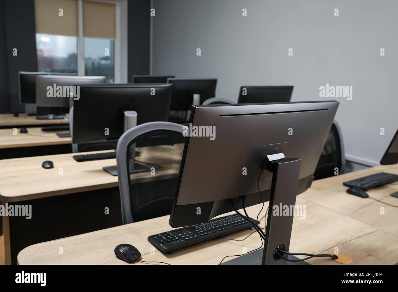 Rows of computers in empty office hi-res stock photography and images ...