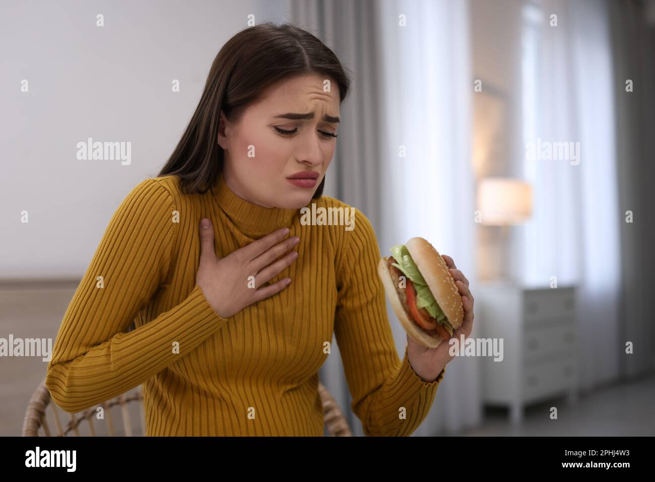 Stomachache eating hi-res stock photography and images - Alamy