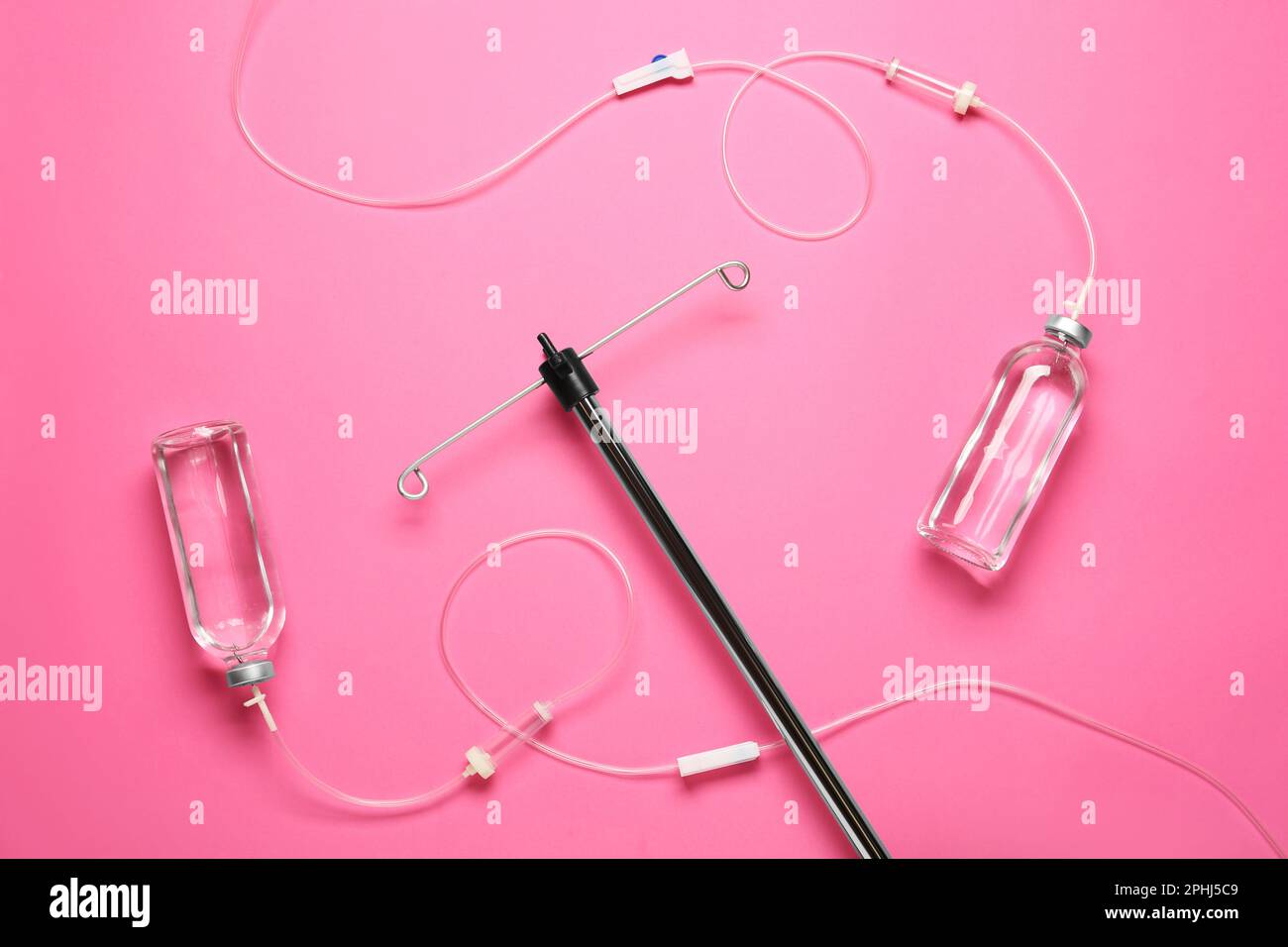 IV infusion set on pink background, flat lay Stock Photo - Alamy