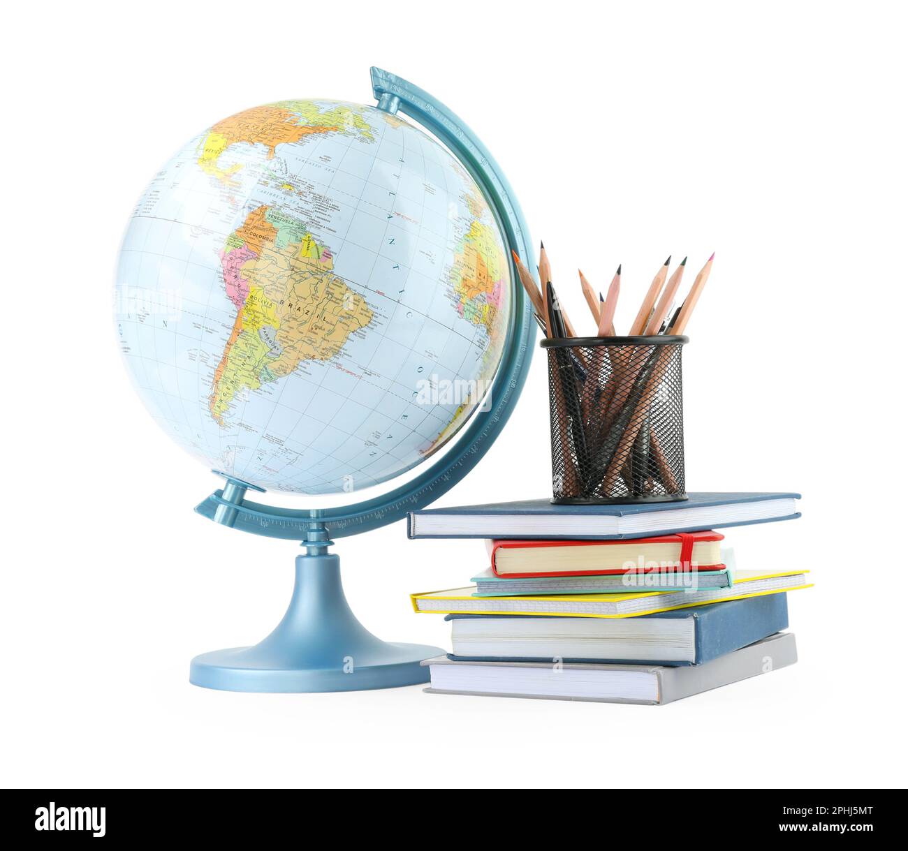 Plastic model globe of Earth, colorful pencils and books on white ...