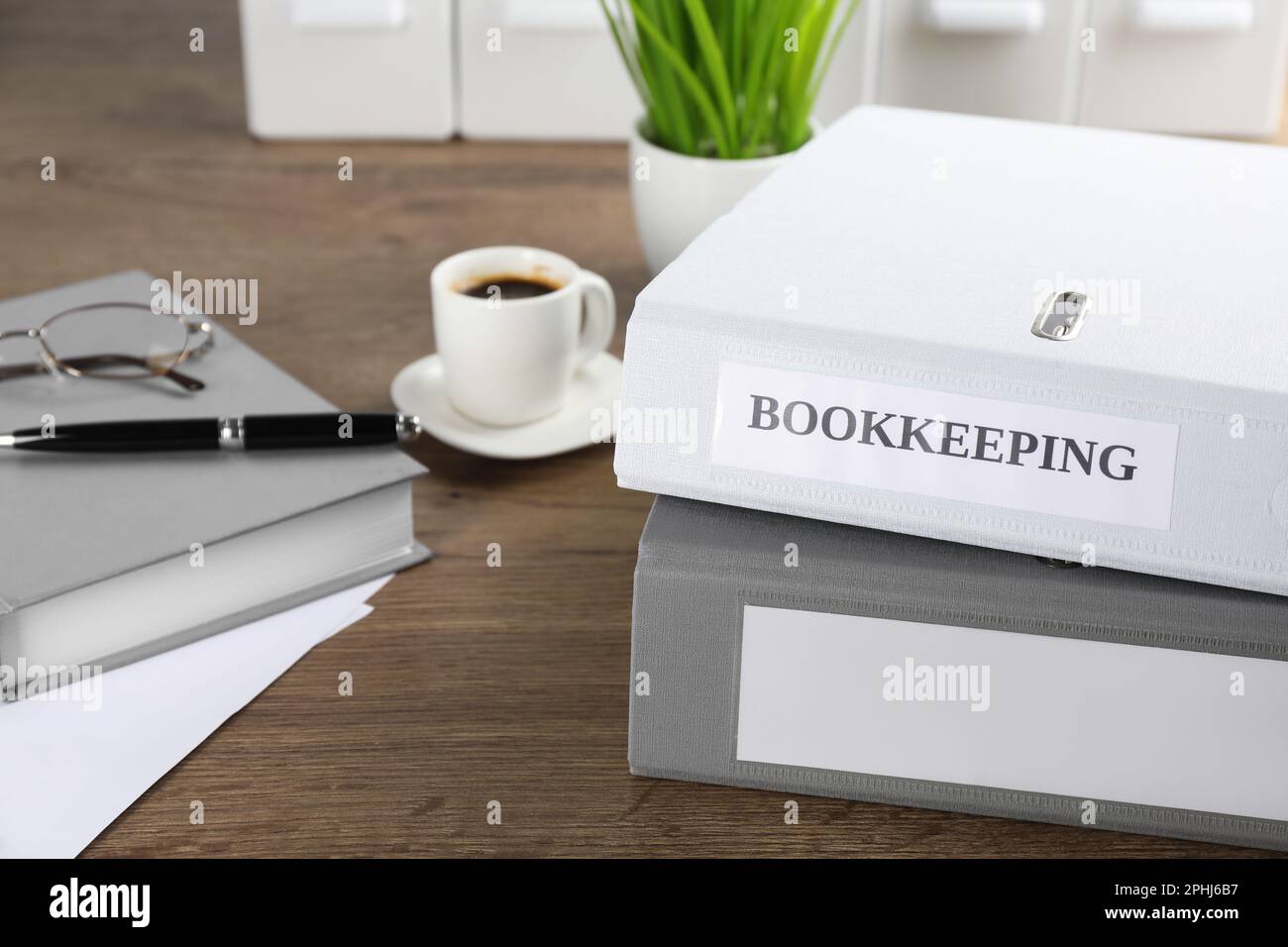 Folders and stationery on desk in office. Bookkeeper's workplace Stock ...