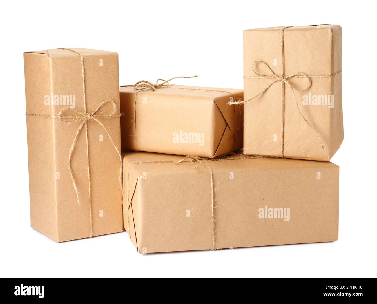 Parcels wrapped with kraft paper and twine on white background Stock ...