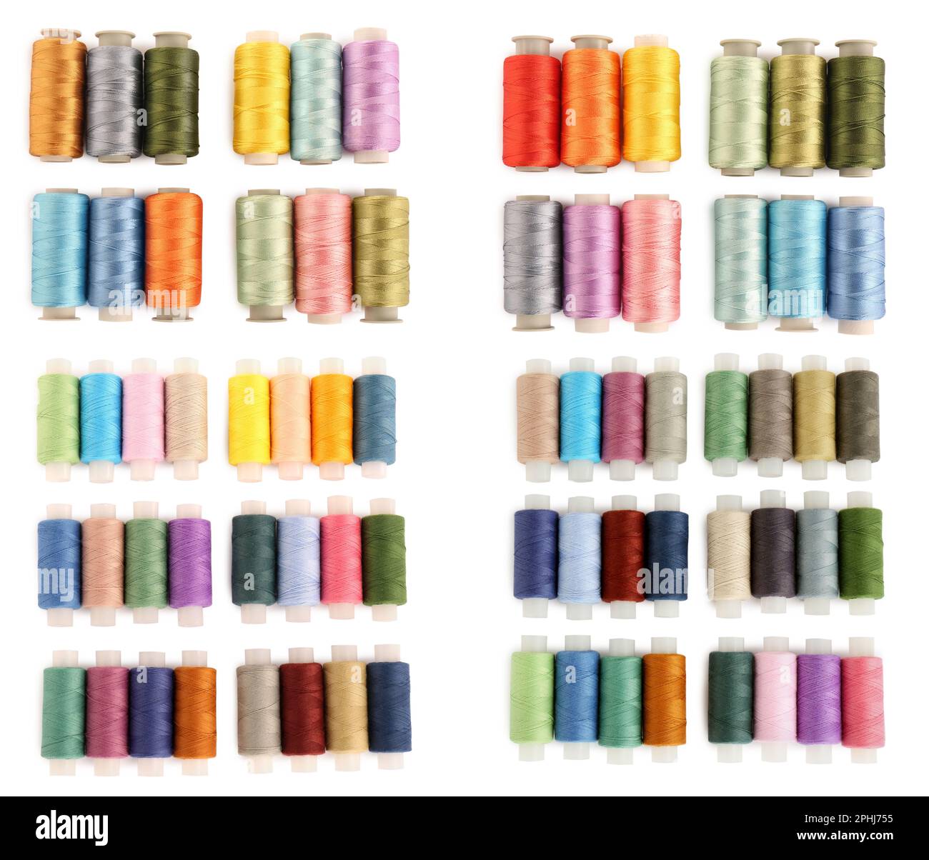 Set with spools of multicolor on white background Stock Photo - Alamy