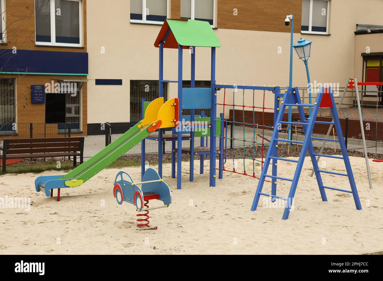 Empty outdoor children's playground in residential area Stock Photo - Alamy