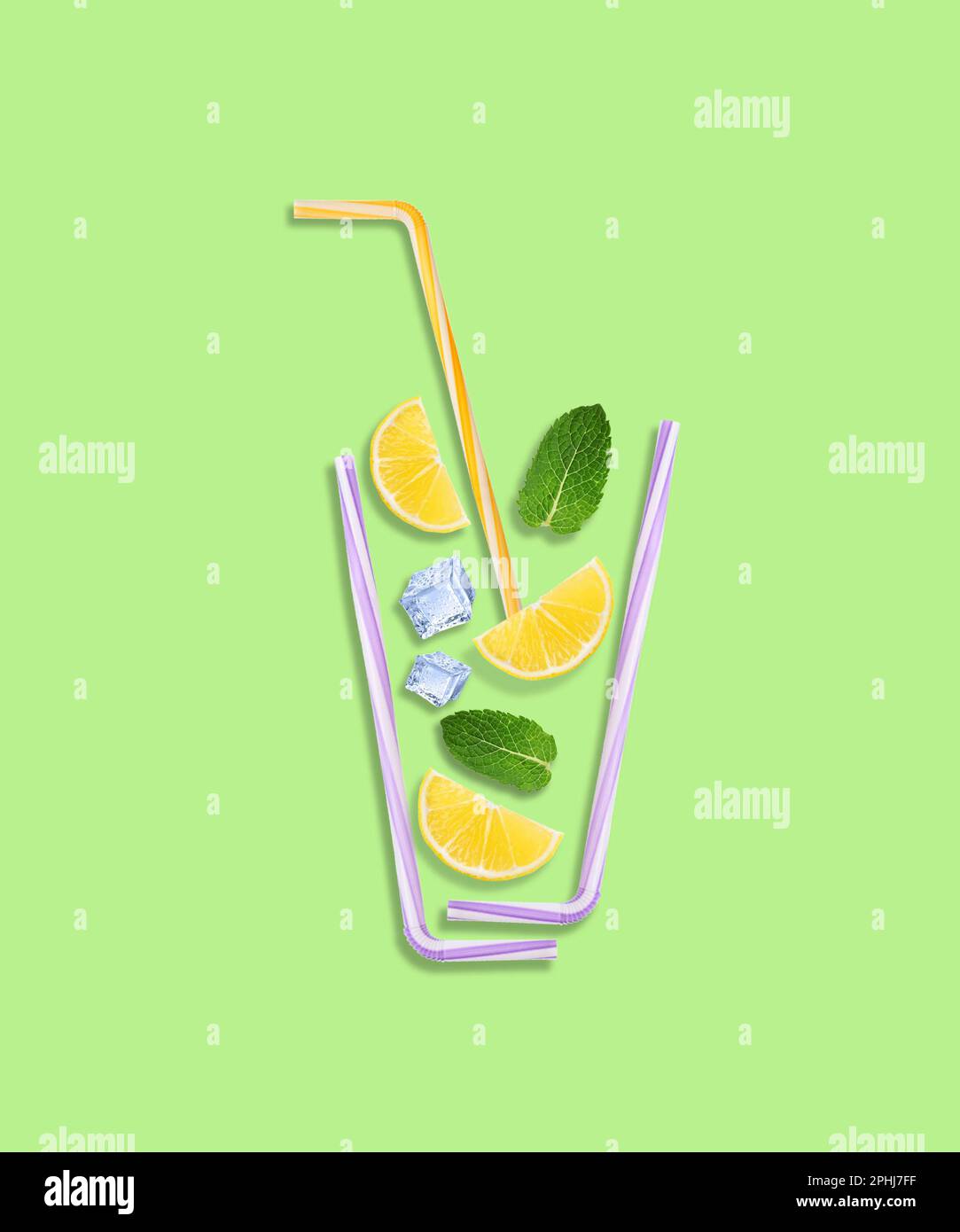 Creative lemonade layout with lemon slices, mint, ice cubes and straws ...