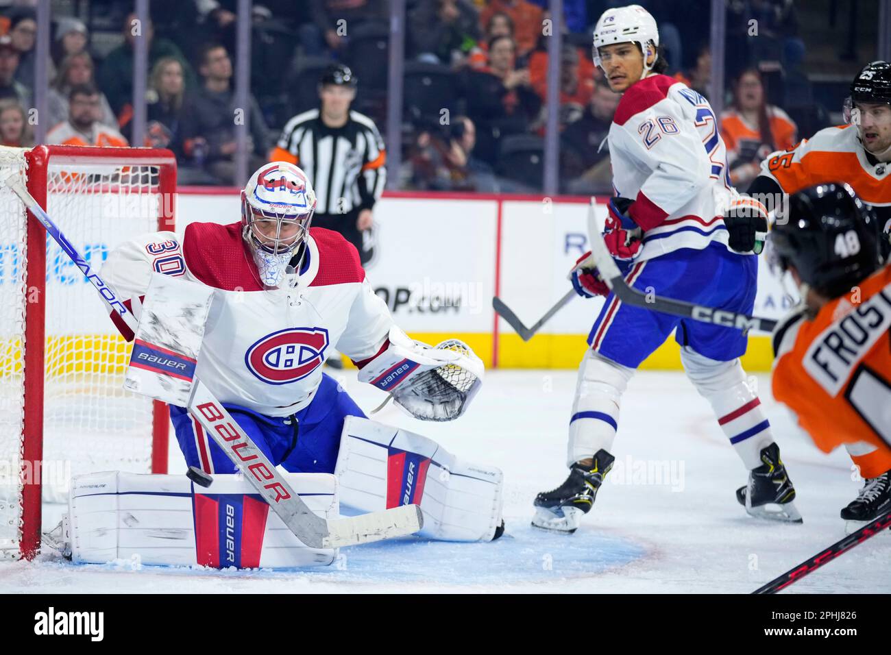 Montreal Canadiens' Cayden Primeau, left, cannot block a goal by ...