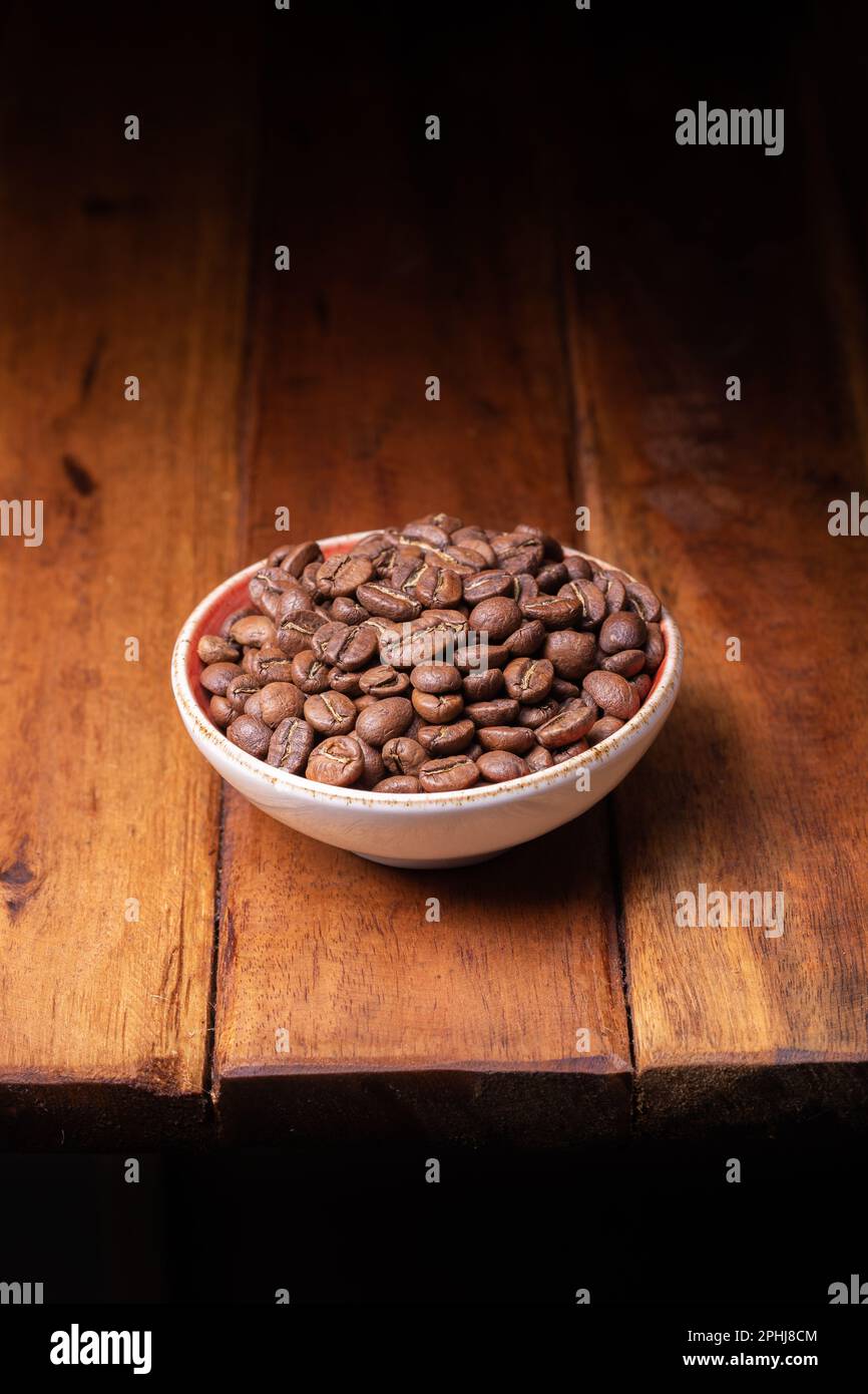 Premium Colombian Coffee Beans on Wooden Plank Stock Photo - Alamy