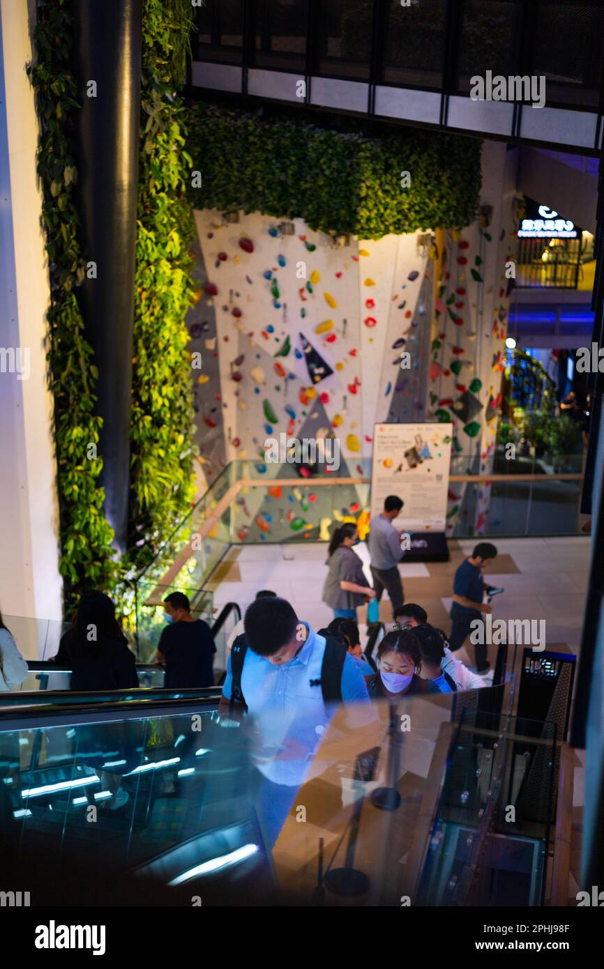 Escalator with Climbing Wall in the Back at Funan Mall Singapore Stock ...