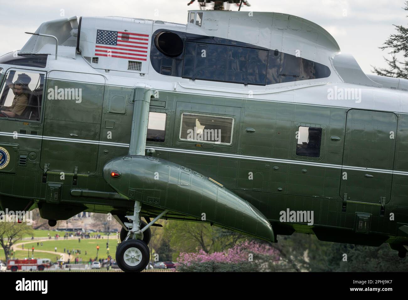 A silhouette of U.S. President Joe Biden is seen in the window of ...